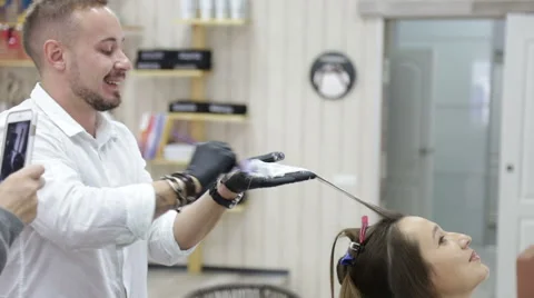 Professional stylist shows master class ... | Stock Video | Pond5
