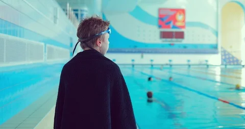 Professional swimmer child or teen goes ... | Stock Video | Pond5