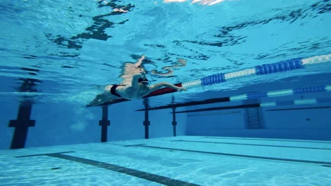 Professional swimmer training in a pool.... | Stock Video | Pond5