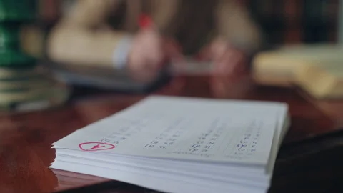 Grading Papers Stock Footage ~ Royalty Free Stock Videos | Pond5