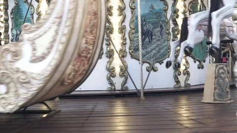 Profile of carousel turning around #2 | Stock Video | Pond5