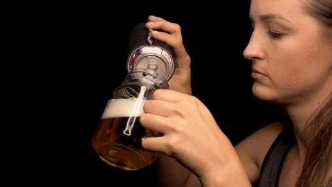 profile of woman quickly chugging a beer | Stock Video | Pond5