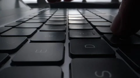 A program coder is typing on laptop keyb... | Stock Video | Pond5