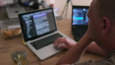 Programmer in cozy home environment work... | Stock Video | Pond5