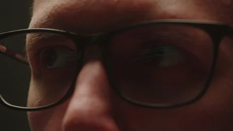 Programmer face close-up. Young man wear... | Stock Video | Pond5