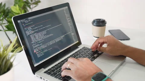 programmer man writing program code sitt... | Stock Video | Pond5