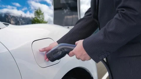 Progressive man in business suit charges... | Stock Video | Pond5