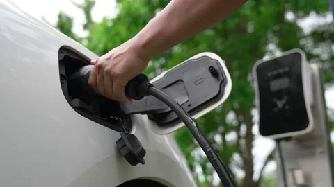 Progressive man install cable plug to hi... | Stock Video | Pond5