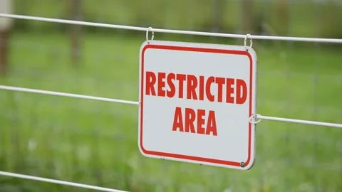 Prohibited area white sign with red text... | Stock Video | Pond5