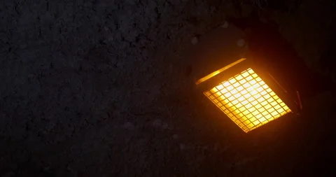 Projector light hanging on ceiling illum... | Stock Video | Pond5