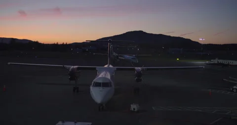 Propeller aircraft waiting to board at s... | Stock Video | Pond5