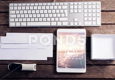 PSD template of keyboard, digital tablet, envelope, box and stapler on ...