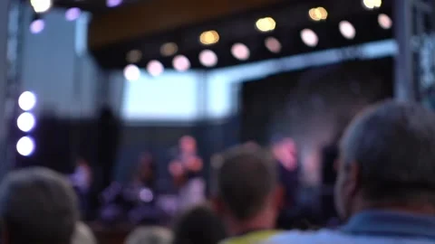 Public concert on the stage. Out of focu... | Stock Video | Pond5