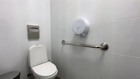 Public inclusive toilet (WC) in clinic o... | Stock Video | Pond5