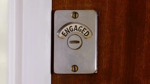 Public toilet / bathroom - engaged sign... | Stock Video | Pond5