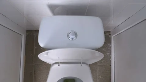 Public toilet. The camera moves from the... | Stock Video | Pond5