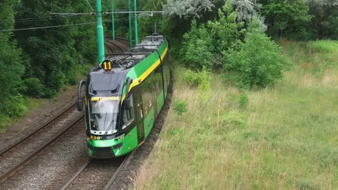 Public transport eco electric tram on ra... | Stock Video | Pond5