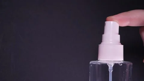 Puff spray on black background | Stock Video | Pond5