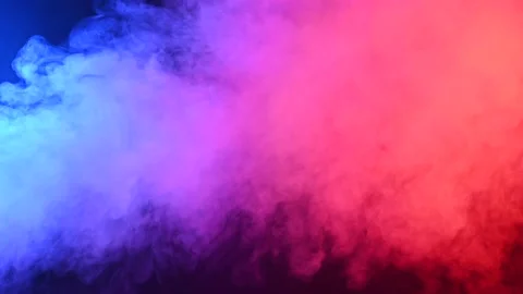 Puffs of colored pink-blue smoke on a bl... | Stock Video | Pond5