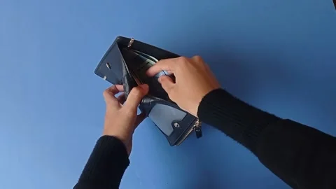 pull out money on a black wallet with a ... | Stock Video | Pond5