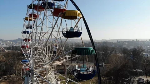 Pull ups on a Ferris Wheel. | Stock Video | Pond5