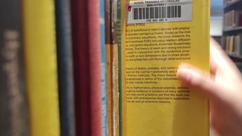 Pulling A Book From The Library Universi... | Stock Video | Pond5
