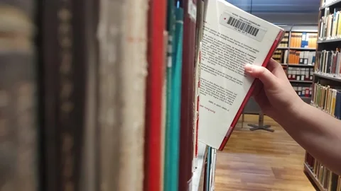 Pulling A Book From The Library Universi... | Stock Video | Pond5
