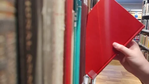 Pulling A Book From The Library Universi... | Stock Video | Pond5