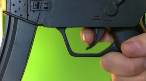 Pulling the Gun Trigger - Action Green S... | Stock Video | Pond5