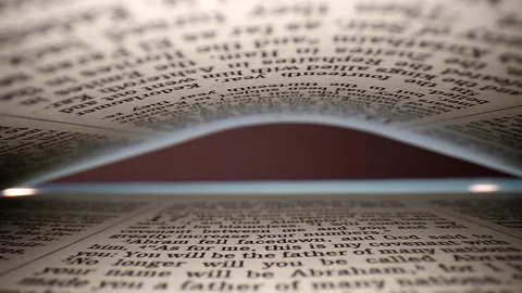 Pulling a lens out of a book diagonally.... | Stock Video | Pond5