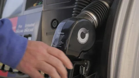 Pulling Out Gas Pump - Pumping Gas | Stock Video | Pond5