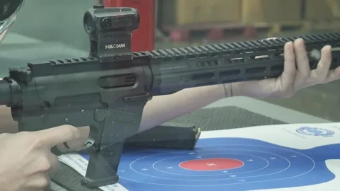 pulling the trigger at shooting range be... | Stock Video | Pond5