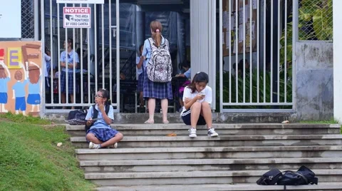 Pupils Sit Outside on the School Steps. ... | Stock Video | Pond5