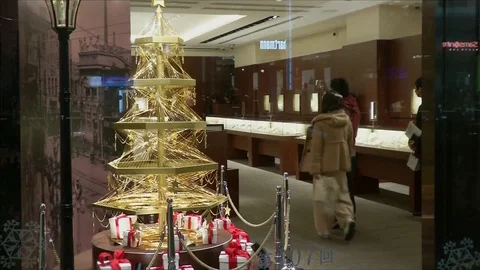 Pure gold Christmas tree give Tokyo a 1.... | Stock Video | Pond5