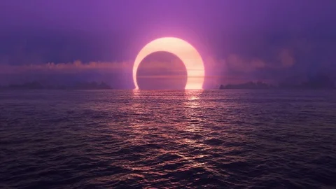 Purple sunset and solar eclipse over sea... | Stock Video | Pond5