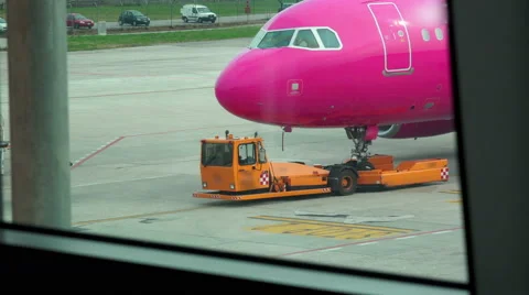 Push-back procedure taking place of an e... | Stock Video | Pond5