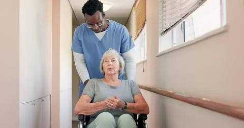 Push, nurse talking or old woman in whee... | Stock Video | Pond5