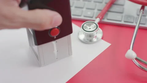 Putting POSITIVE COVID-19 TEST stamp on ... | Stock Video | Pond5