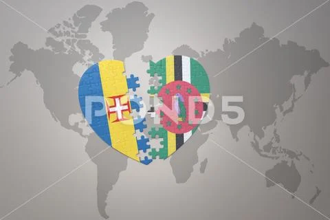 Puzzle heart with the national flag of dominica and madeira on a world ...