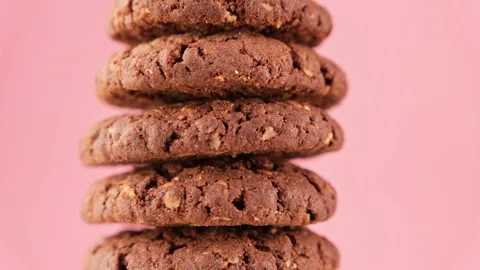 Pyramid of brown oatmeal cookies rotatin... | Stock Video | Pond5