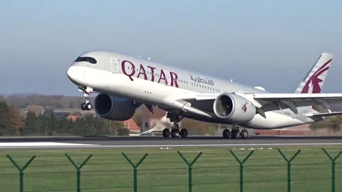 Qatar Airways Big Passenger Jet Hard Lan... | Stock Video | Pond5