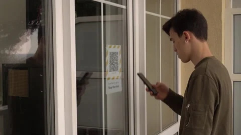QR code on the doors at the entrance to ... | Stock Video | Pond5