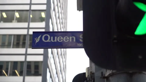 Queen street sign with office building i... | Stock Video | Pond5