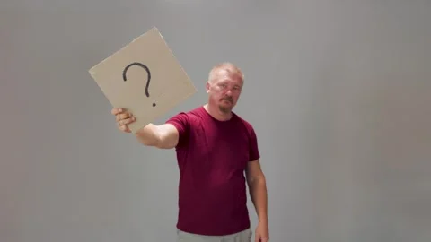 Question mark. Adult man with mustache h... | Stock Video | Pond5