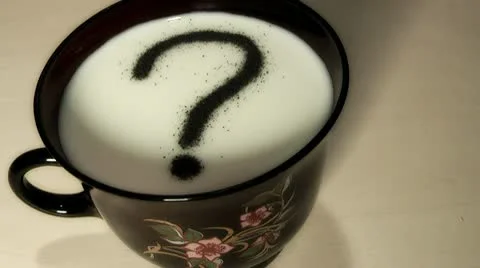 question mark,character in a cup of milk... | Stock Video | Pond5