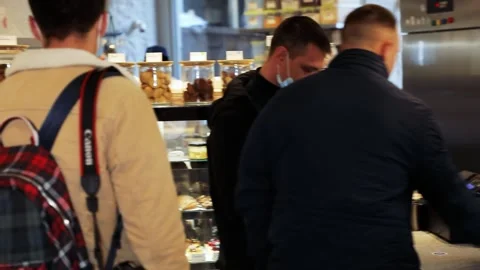 The queue at the coffee shop. Takeaway c... | Stock Video | Pond5