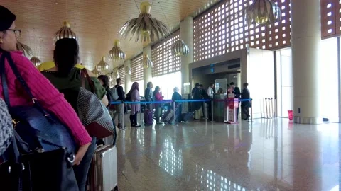 Queue inside the airport boarding gate. | Stock Video | Pond5