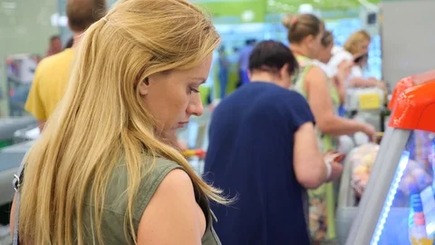 The queue of people standing at the chec... | Stock Video | Pond5