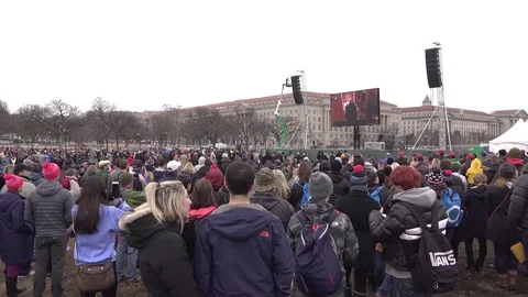 Quiet crowd at inauguration watching Don... | Stock Video | Pond5