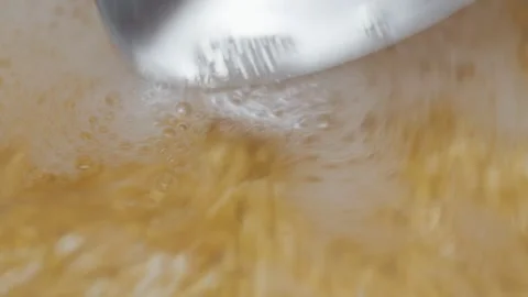 Quinoa grains into boiling water inside ... | Stock Video | Pond5